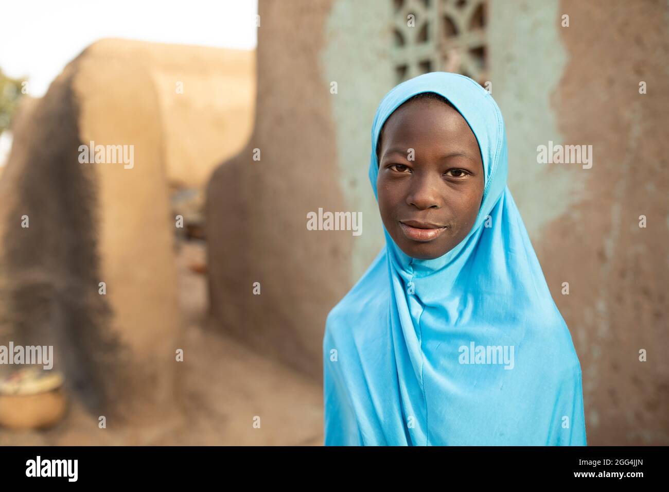 Portrait of a girl in a blue islamic hijab in Barouéli Cercle, Ségou ...
