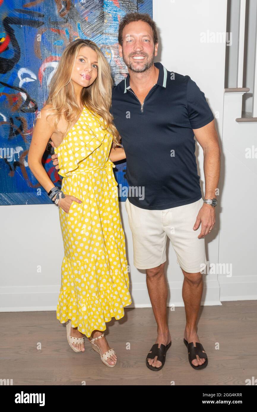 Hosts Anna Michalczyk and Joe Michalczyk attend Zero G Hamptons End of ...