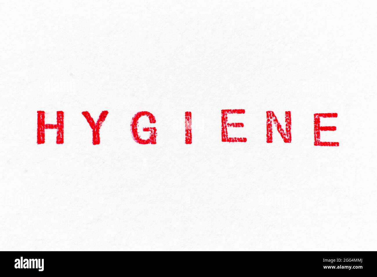 Red color ink rubber stamp in word hygiene on white paper background ...