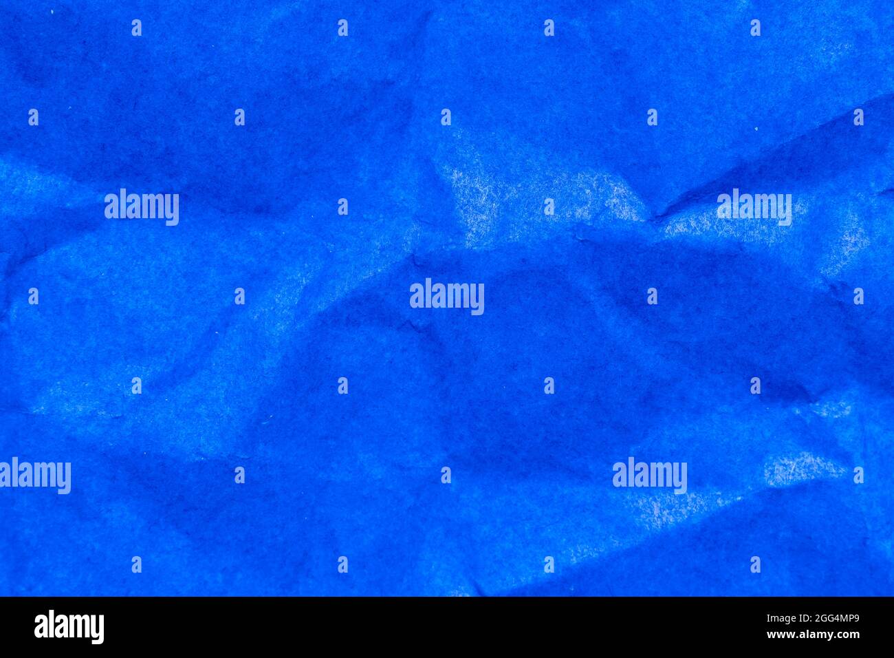 Grunge wrinkled blue color paper textured background Stock Photo - Alamy