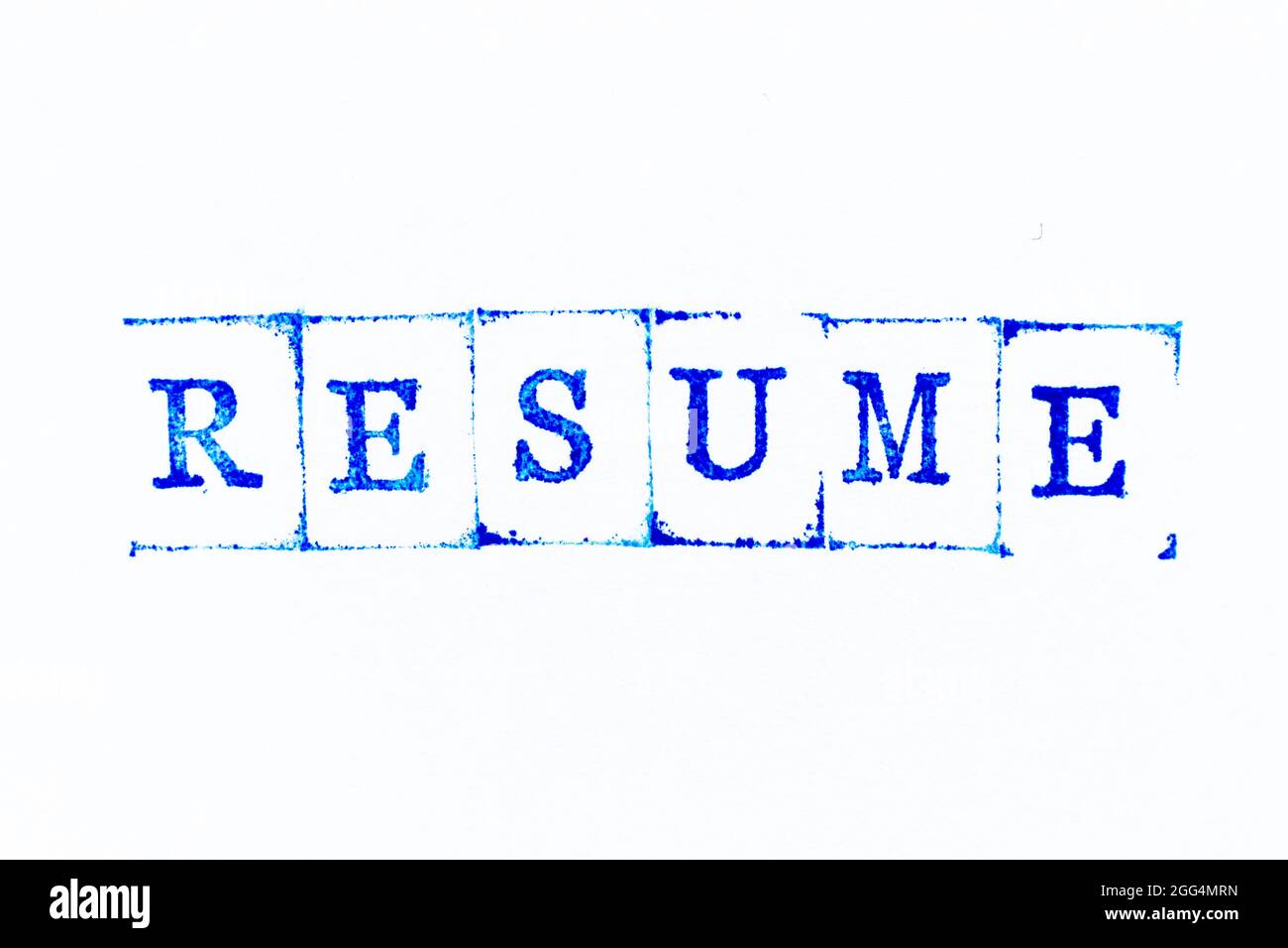Blue color ink rubber stamp in word resume on white paper background ...