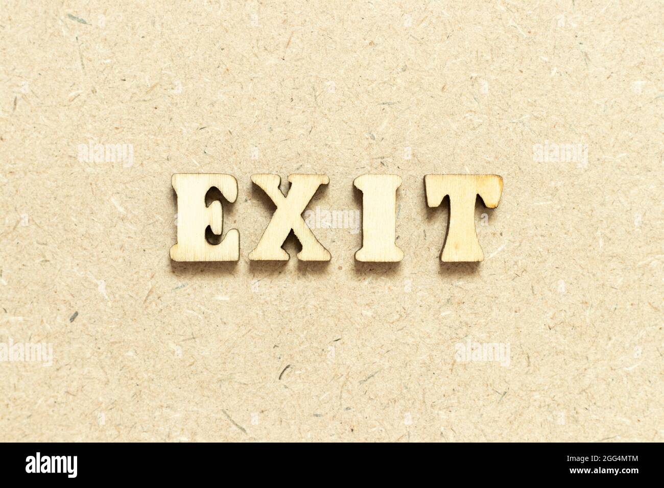 Alphabet letter in word exit on wood background Stock Photo - Alamy