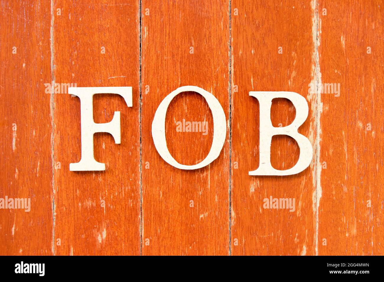 Alphabet letter in word FOB (Abbreviation of Free on Board) on old red ...