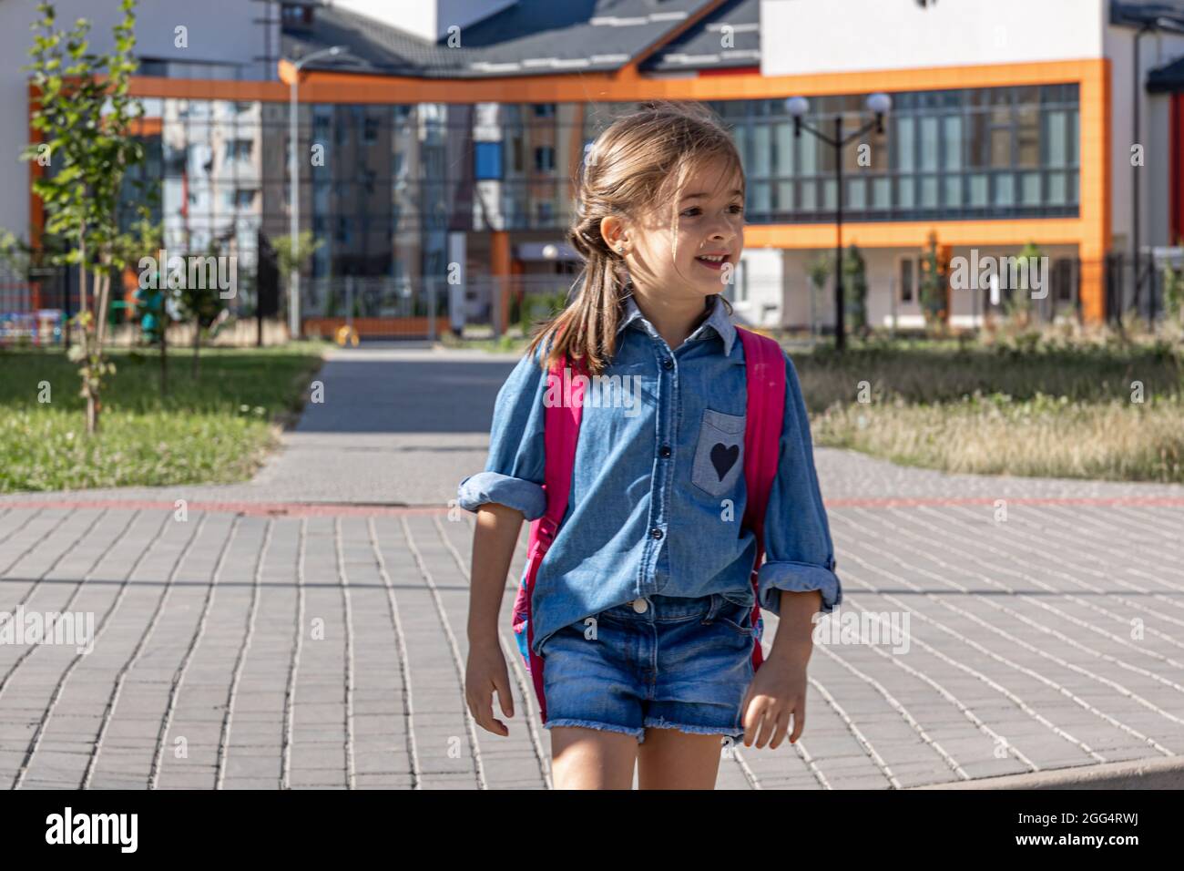 A primary school student goes home after school, the first day of ...