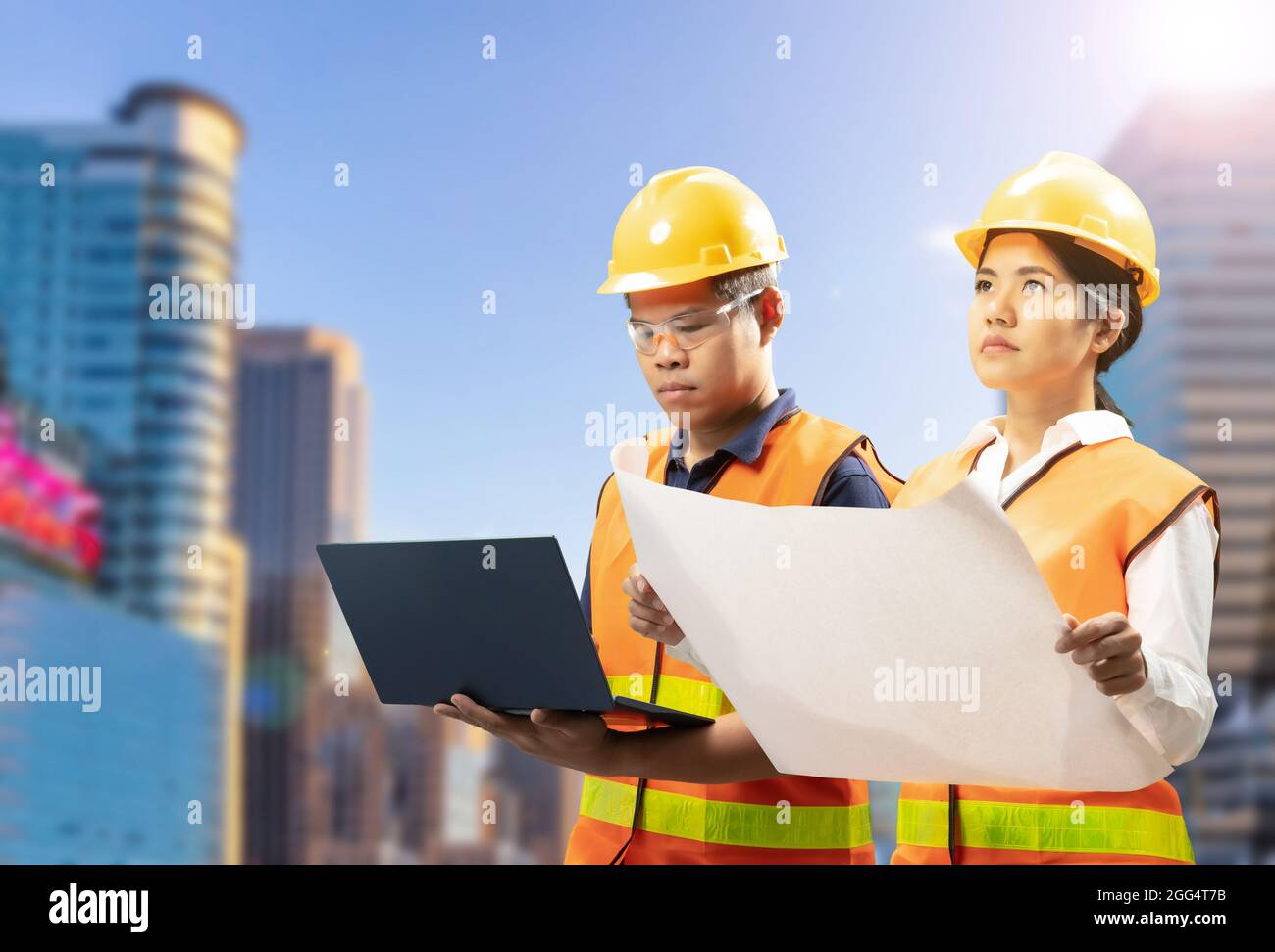 Construction business concept with civil engineer and cityscape ...