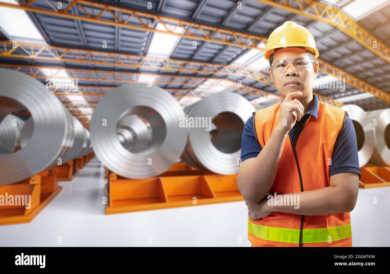 Asian engineer or technician work in steel factory Stock Photo - Alamy