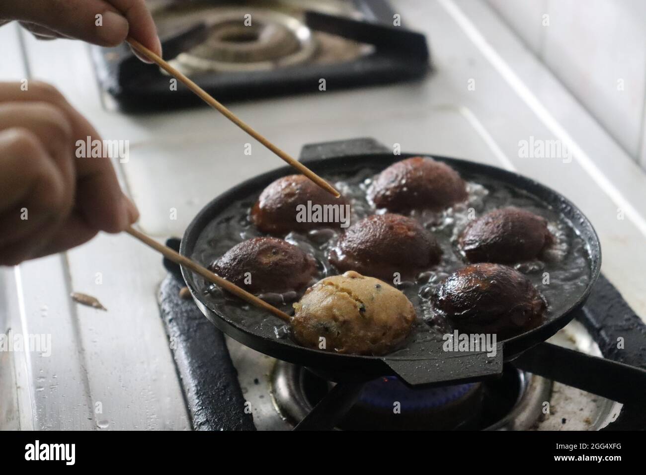 Making of unni appam using unni appam pan. Unni appam or Rice fritters ...