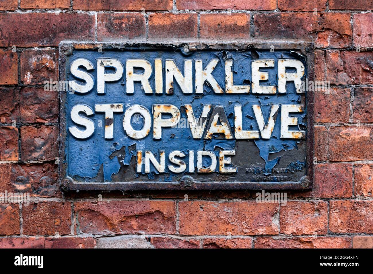 Sprinkler Stop Valve sign. Manchester city centre Stock Photo - Alamy