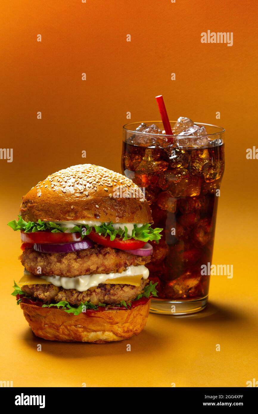 Delicious burger with cola Stock Photo - Alamy