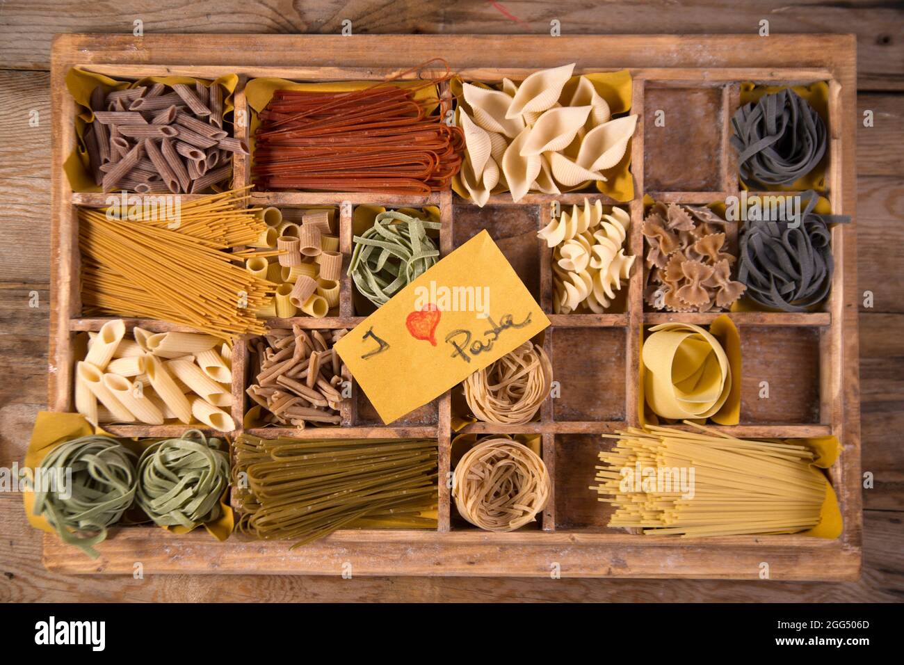 Presentation in wooden varieties of pasta made in Italy Stock Photo - Alamy