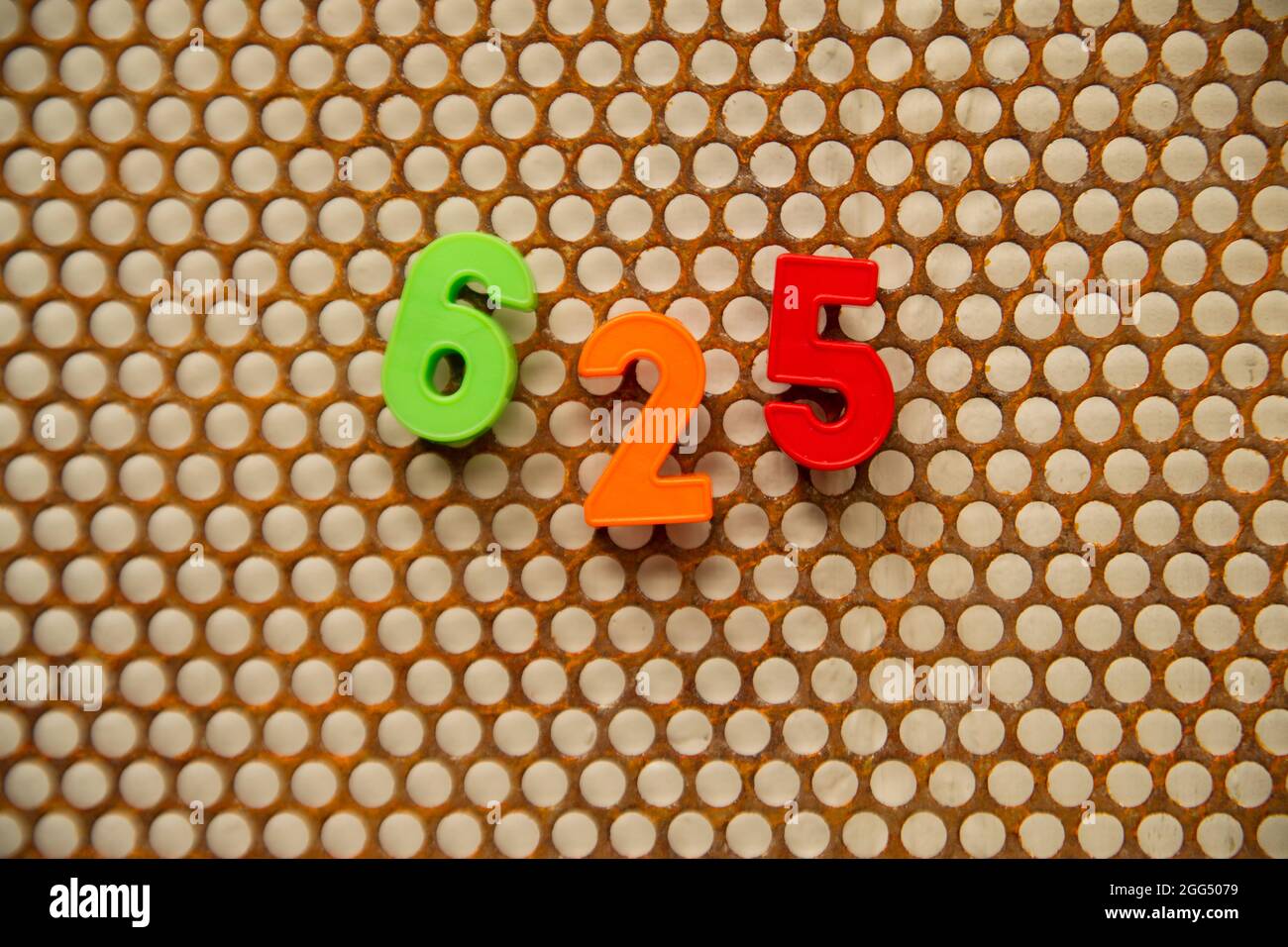 Series of letters and numbers on white base metal Stock Photo - Alamy
