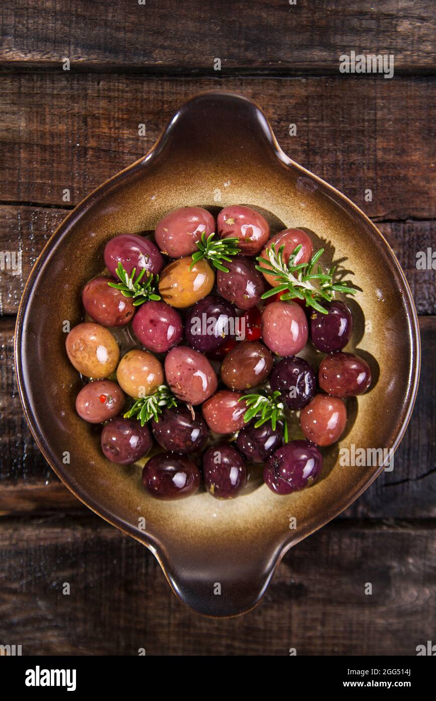 Italian food, snack of olives in brine presented in flat Stock Photo ...