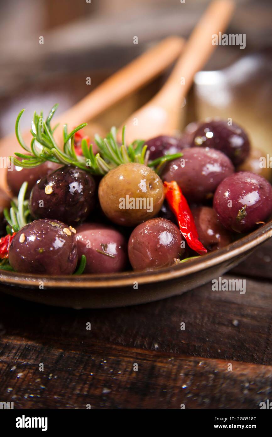 Italian food, snack of olives in brine presented in flat Stock Photo ...