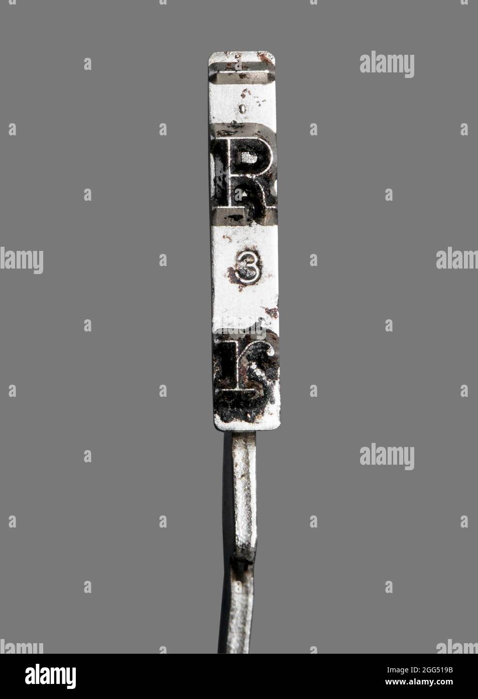 Macro of a old typywriter hammer Letter R Stock Photo - Alamy