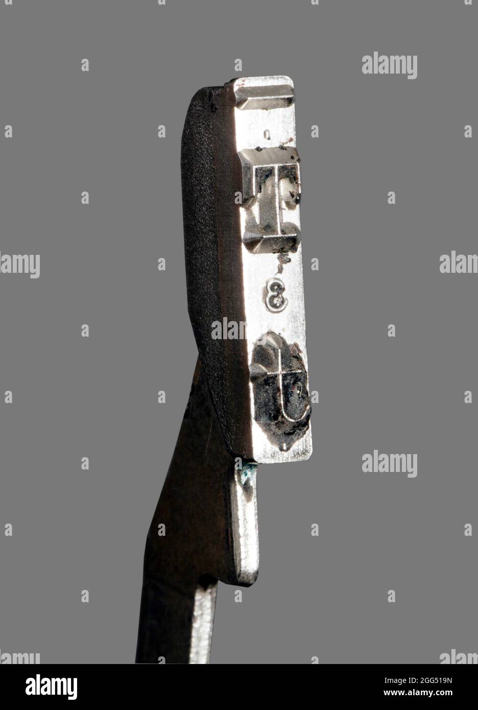 Macro of a old typywriter hammer Letter T Stock Photo - Alamy