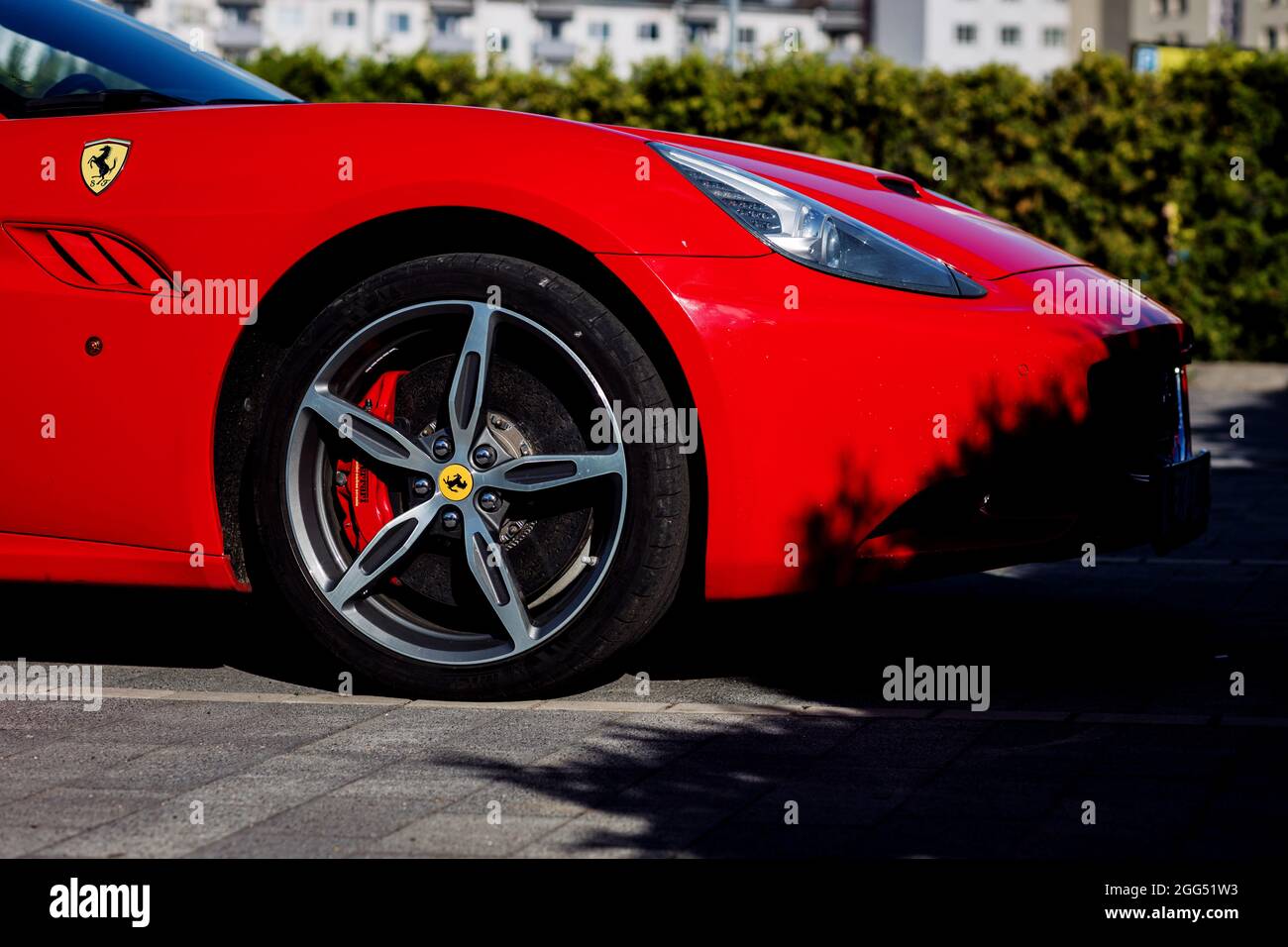 Italian luxury red Ferrari. supercar in the parking lot Stock Photo - Alamy