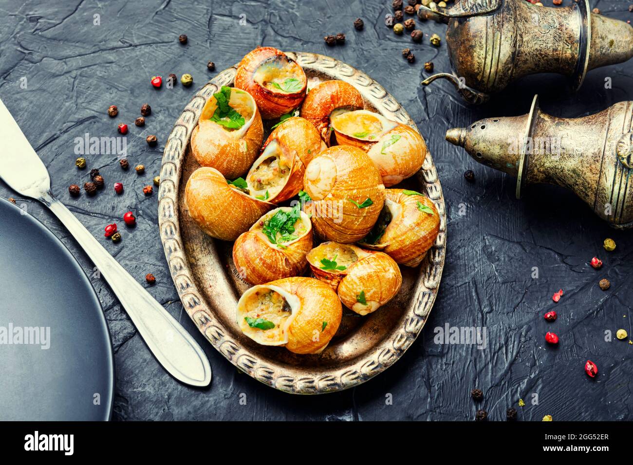 Bourgogne snail or escargot stuffed with green butter, French food ...