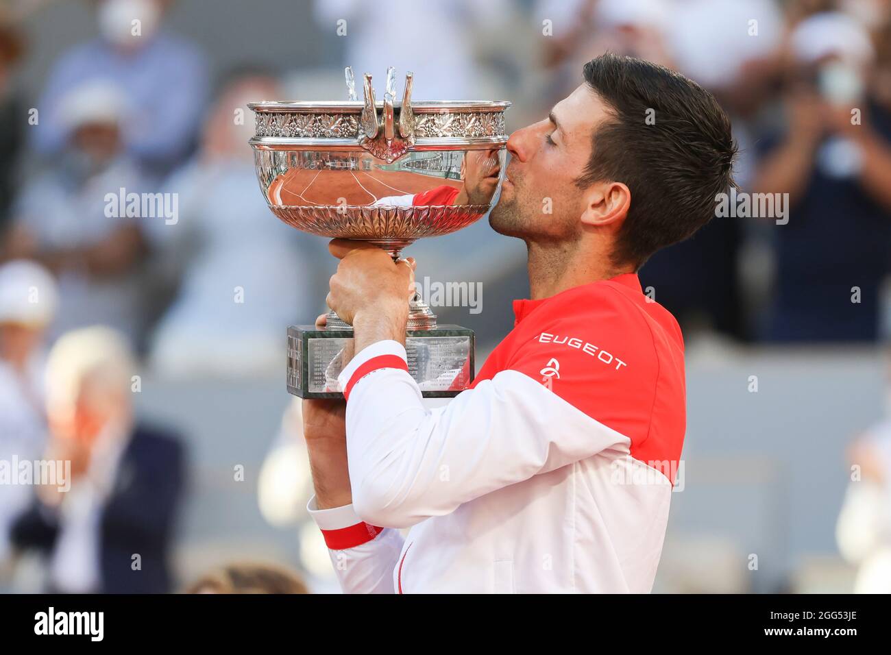 Serbian tennis player Novak Djokovic (SRB) kissing championship trophy ...