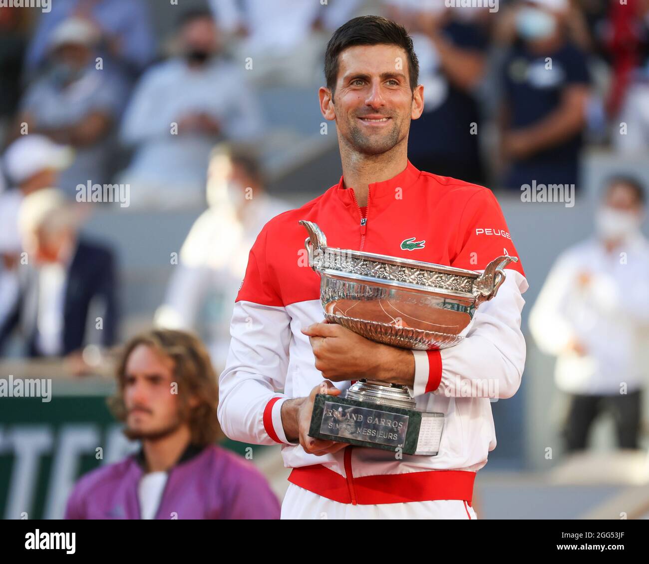 Serbian tennis player Novak Djokovic (SRB) holding championship trophy ...