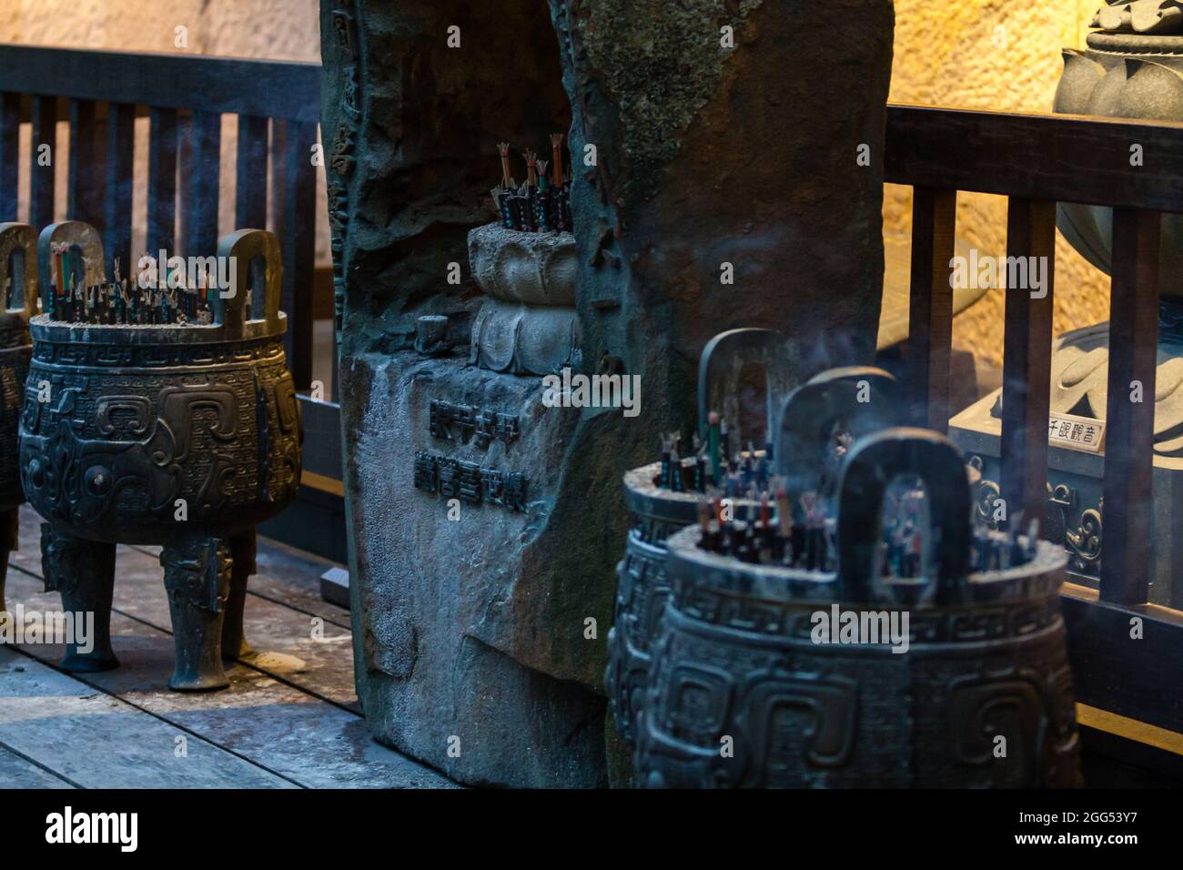 Incense burning inside temple hi-res stock photography and images - Alamy