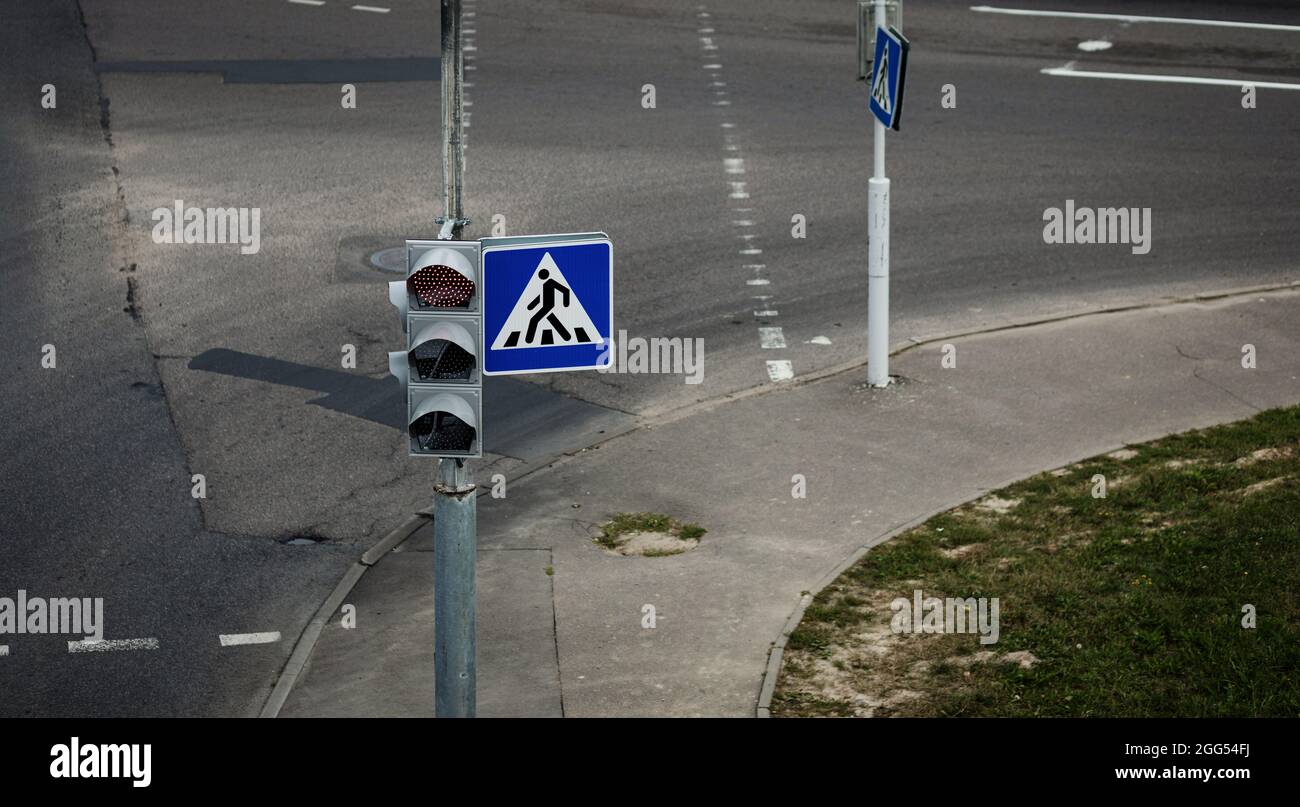 Traffic lights over urban intersection. Red light Stock Photo - Alamy