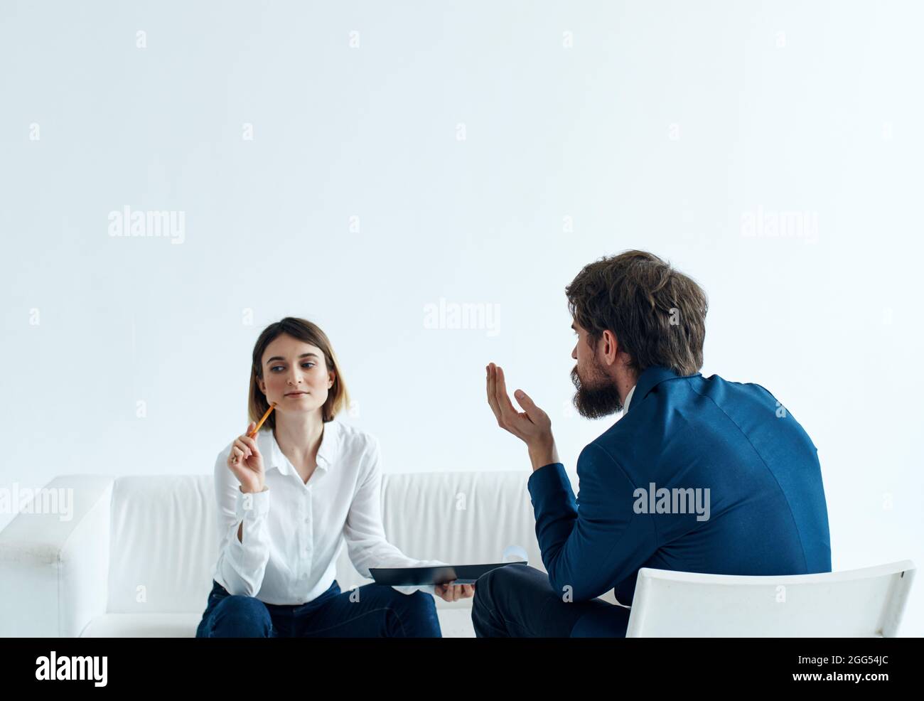 man and woman communicate work team documents Stock Photo - Alamy