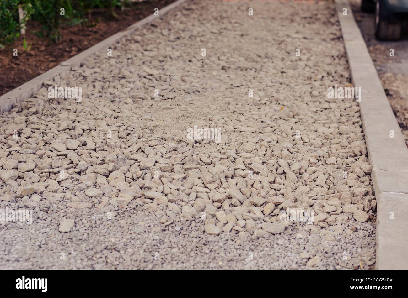Construction of new sidewalks. Pedestrian walkway fenced with new curbs ...