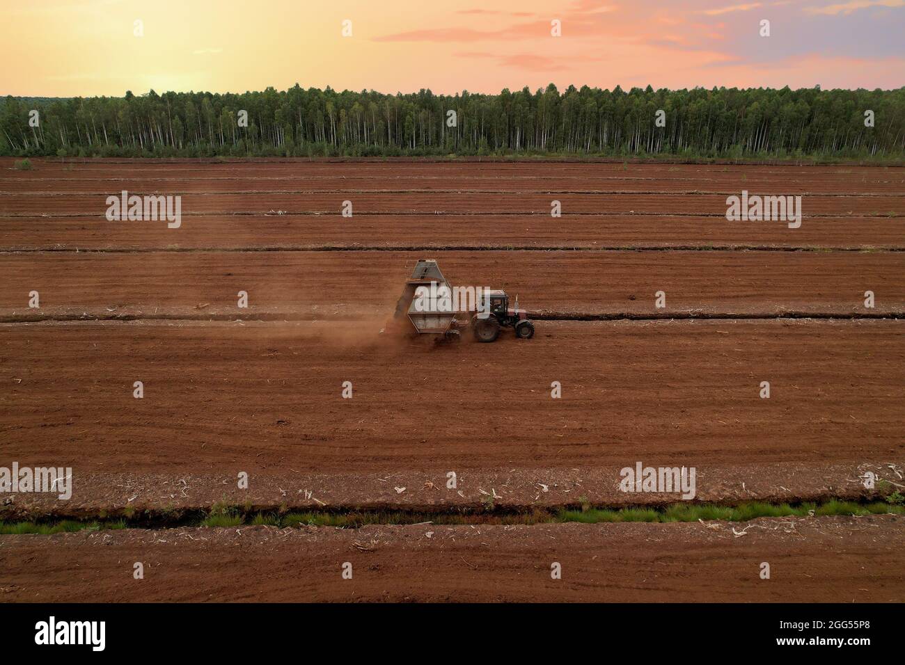 Peat Harvester Tractor on Collecting Extracting Peat. Mining and ...
