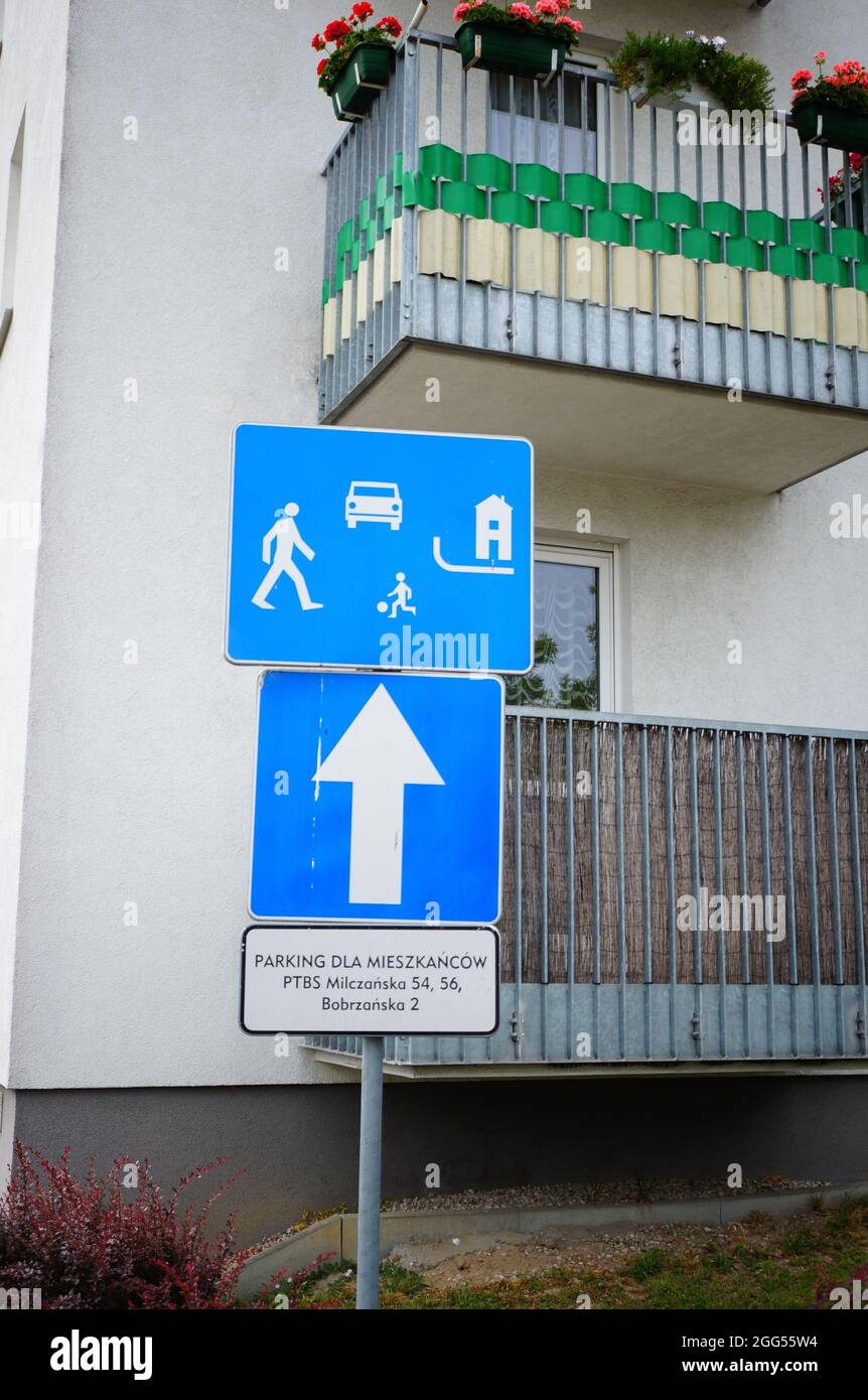 A blue traffic road sign of parking for the residents in the Polish ...