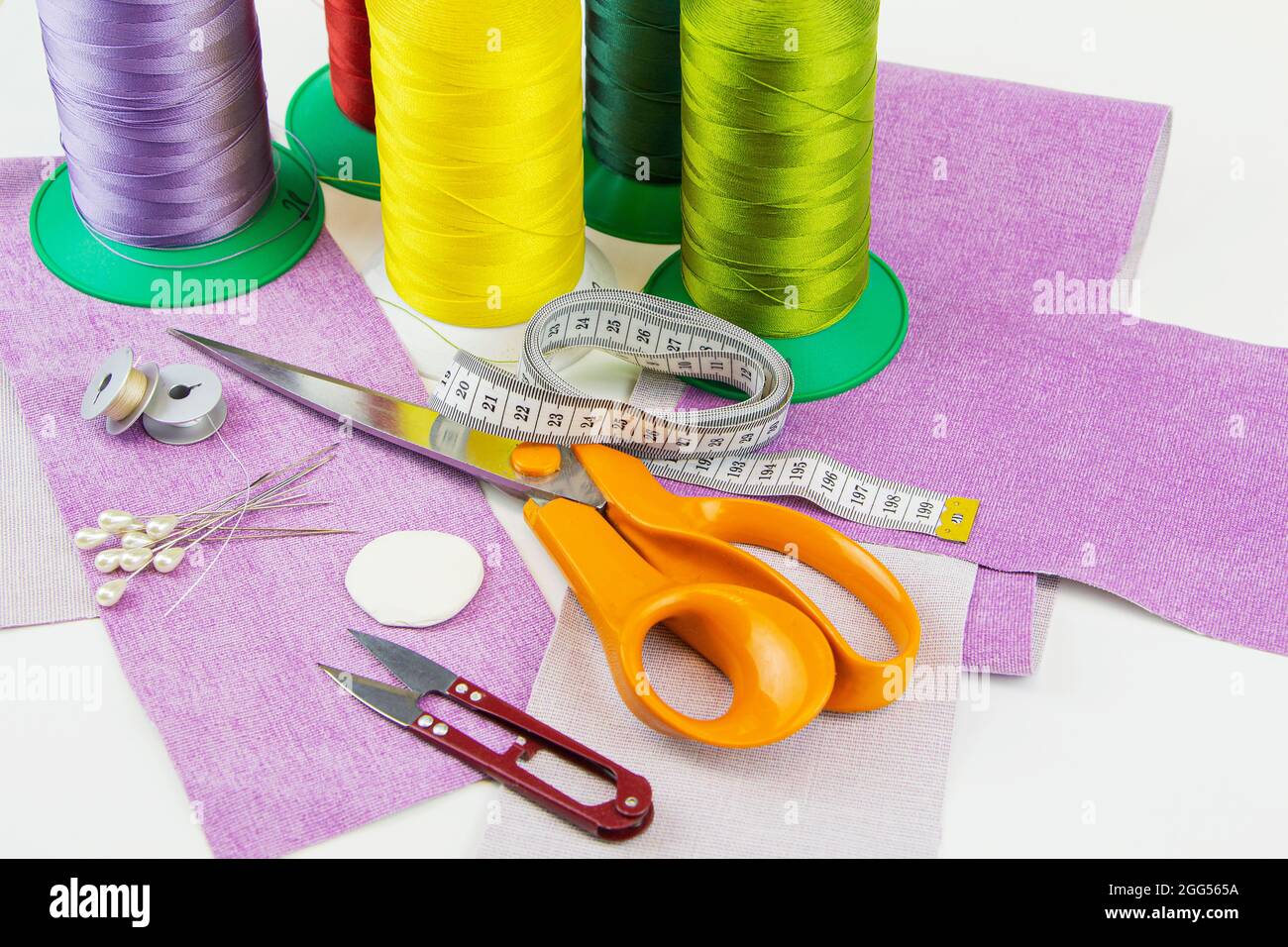 Pieces of cloth and thread. Tailoring, manufacture of upholstered ...
