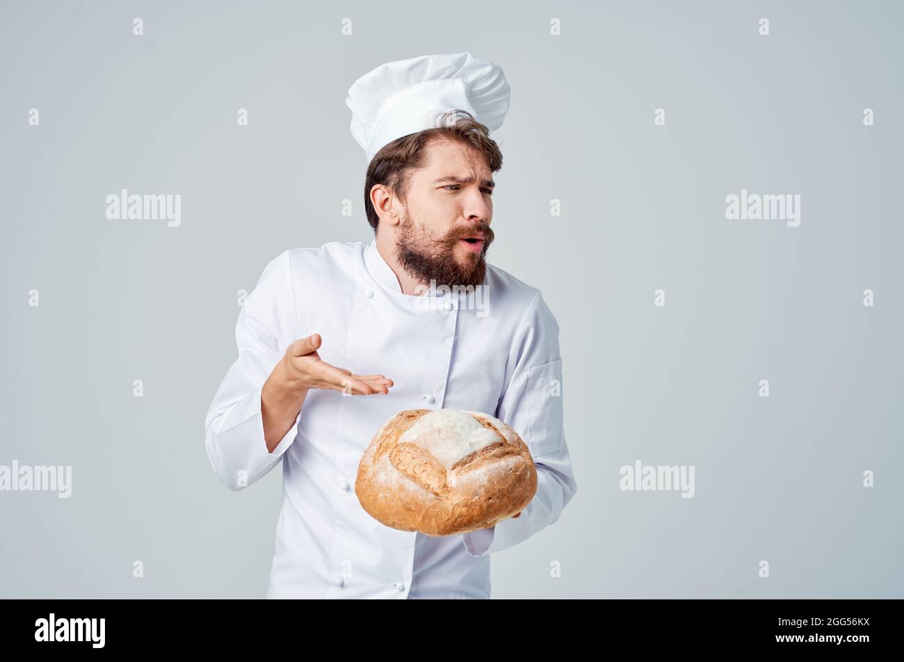 Baker kitchen Job bakery products isolated background Stock Photo - Alamy