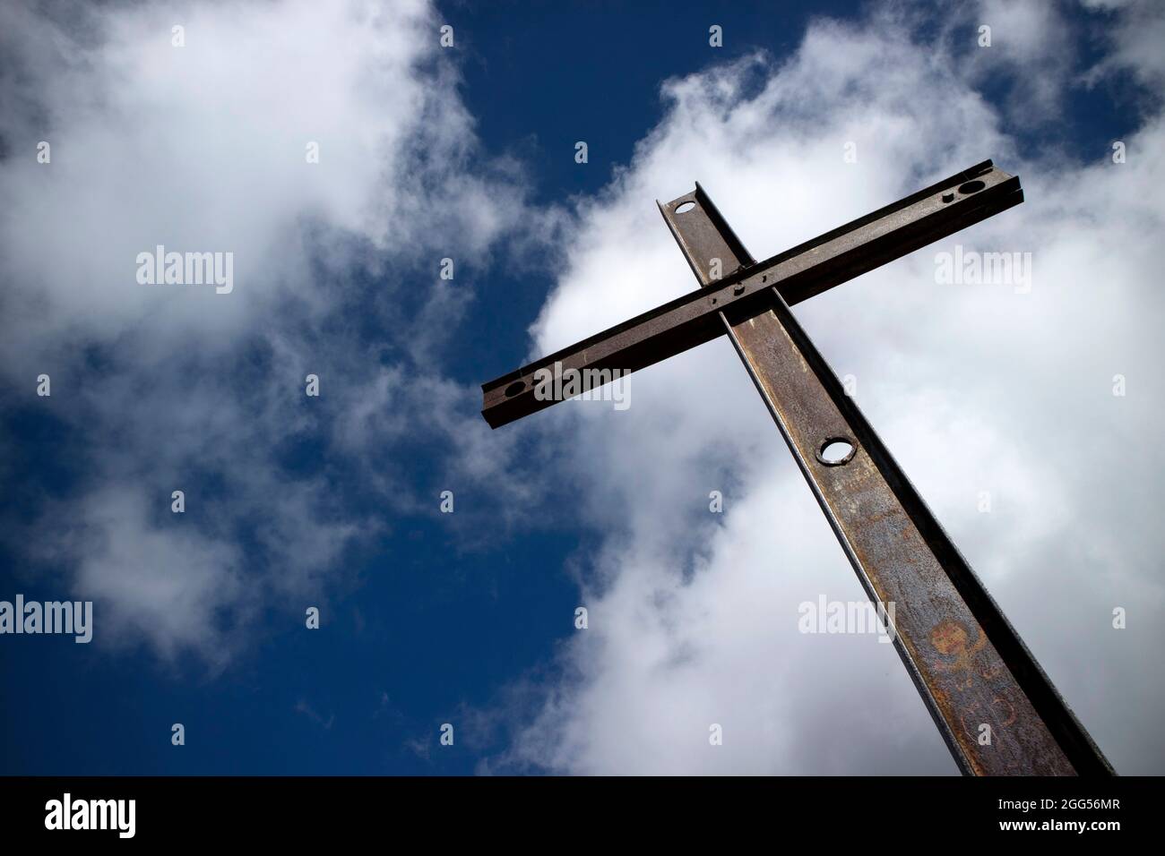 The iron symbol of the Catholic religion seen in cloudy sky Stock Photo ...