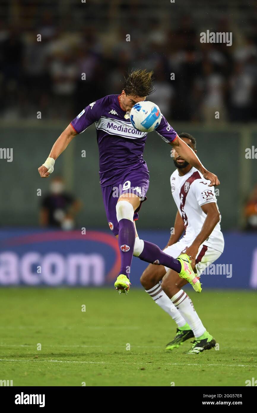 Dusan Vlahovic (Fiorentina)Koffi Djidji (Torino) during the Italian "Serie A match between ...