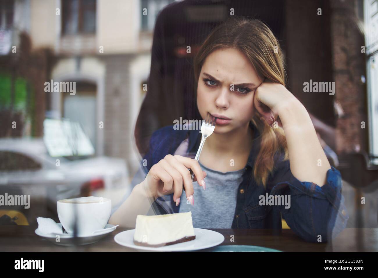beautiful woman sitting in a cafe rest Lifestyle Stock Photo - Alamy