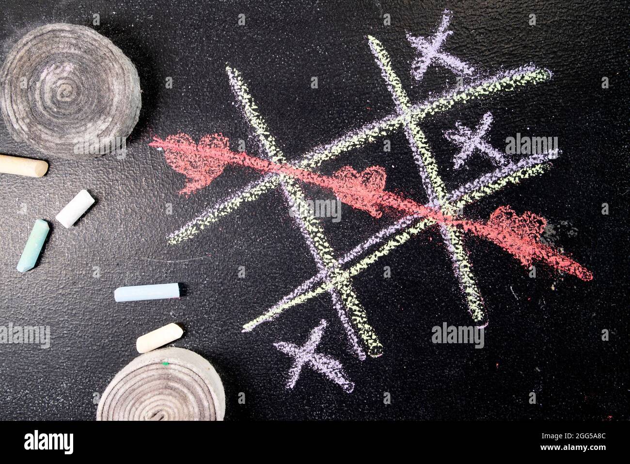 Photographic representation drawn with chalk of the game of tic-tac-toe ...