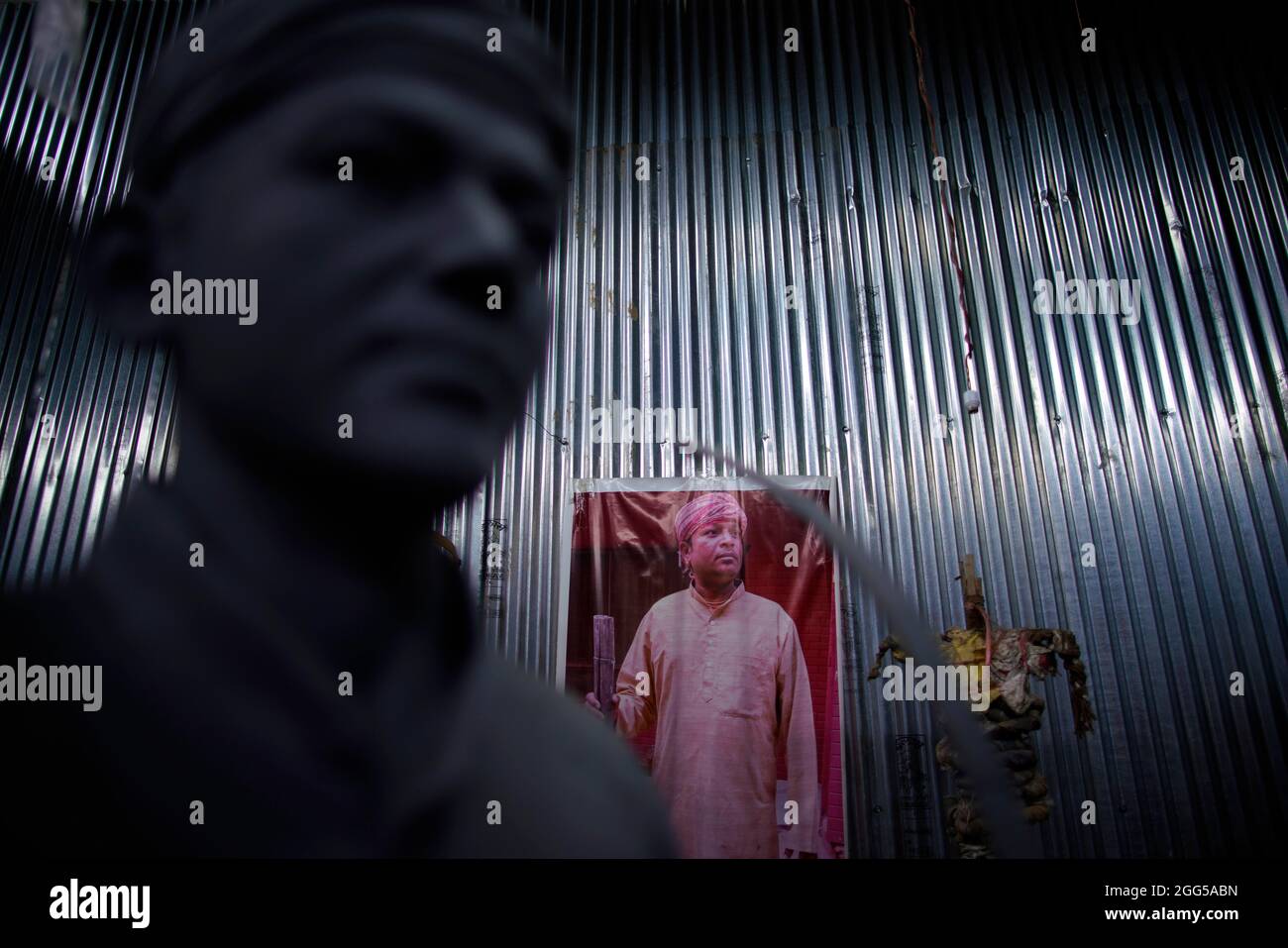 Kathmandu, Nepal. 29th Aug, 2021. Hari Ram Adhikari, 32, sculpting a ...