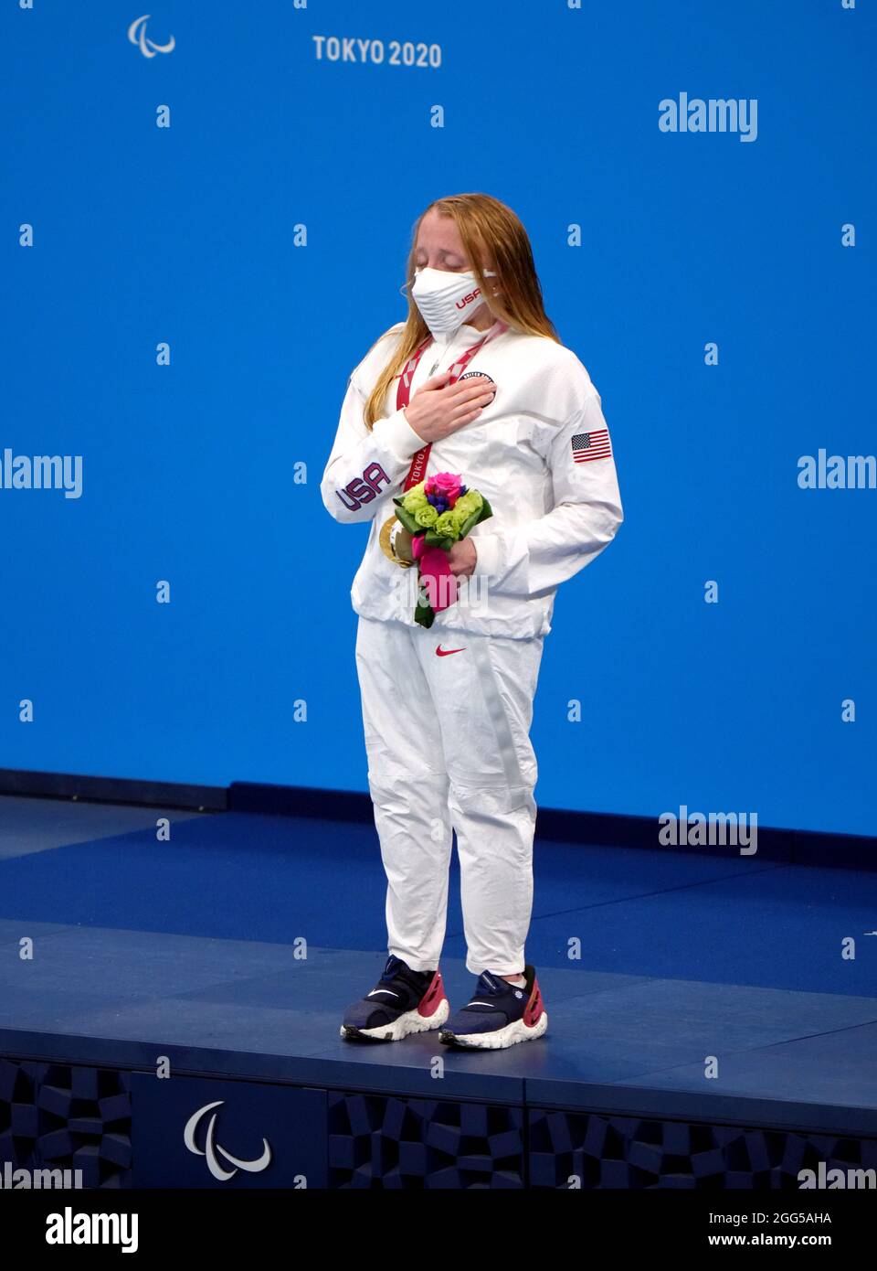 USA’s McKenzie Coan receives her Gold medal for the Women's 400m ...