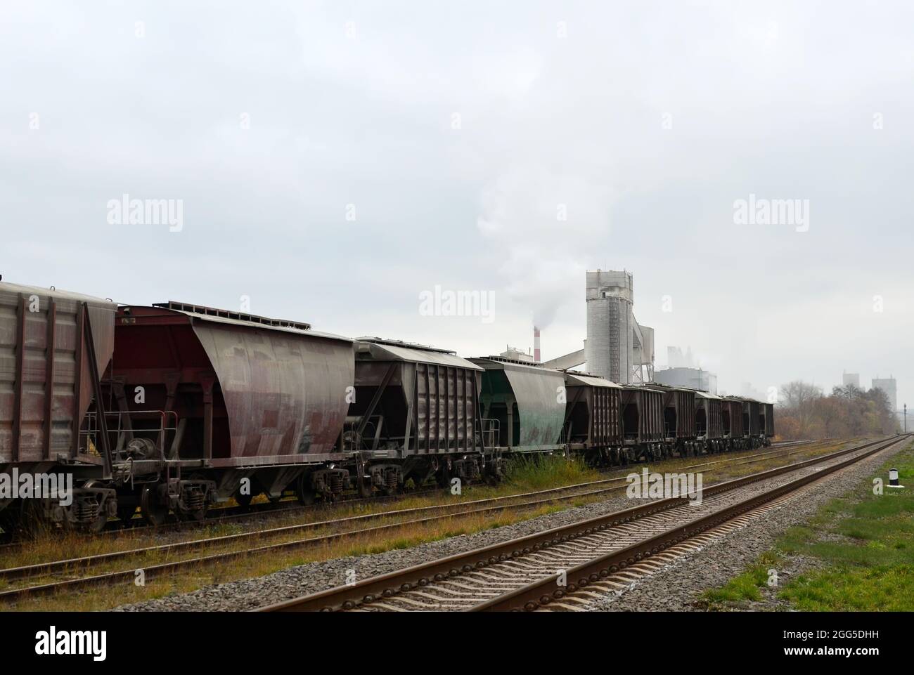 Railroad cars at cement manufacturing plant. Ready-mix and building ...