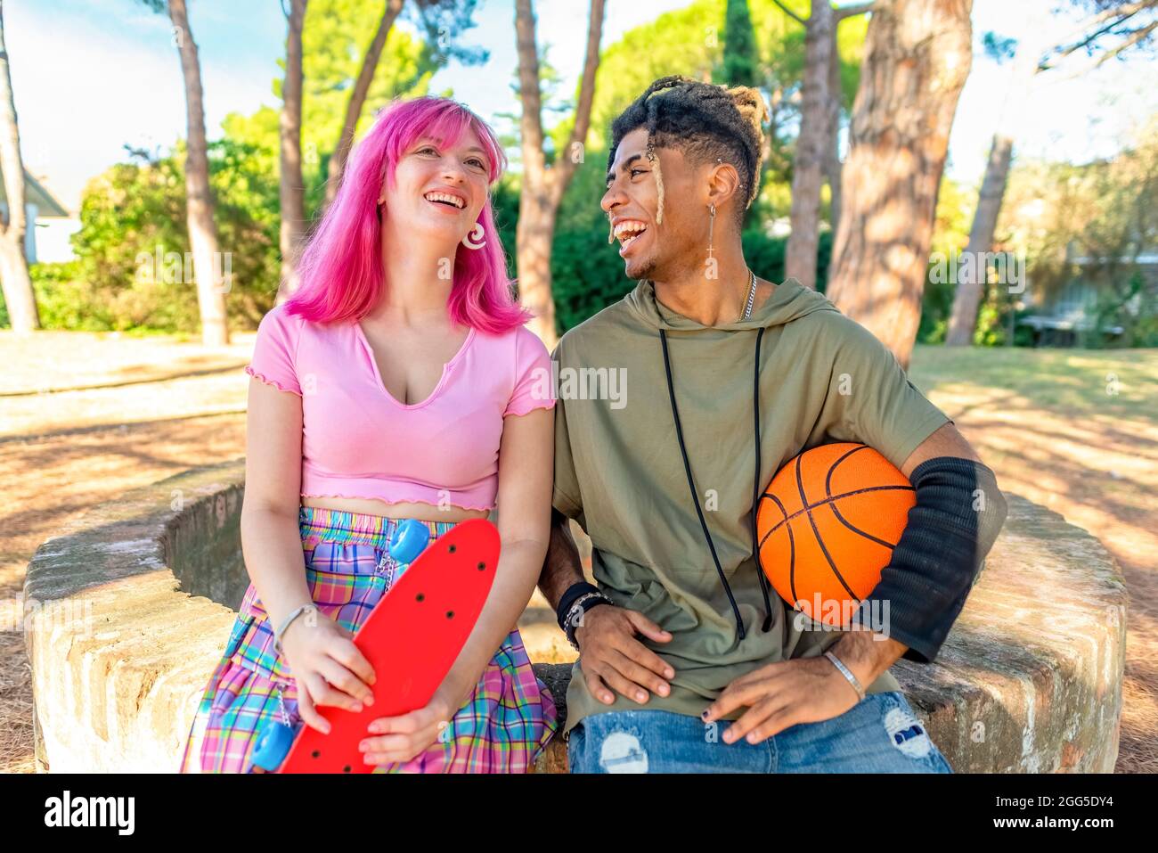 Alternative Diverse Couple Hanging Out Together Chilling And Smiling