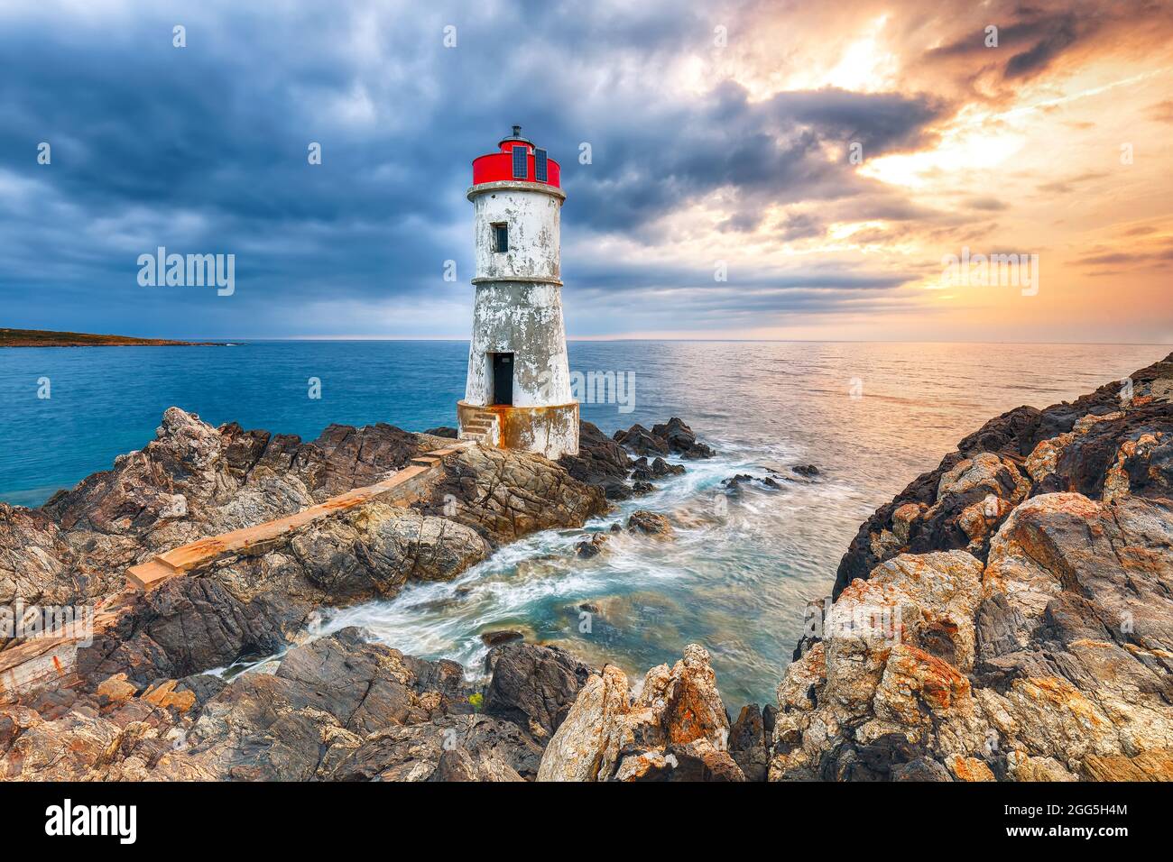 Dramatic gloomy view of Capo Ferro Lighthouse. Popular travel ...