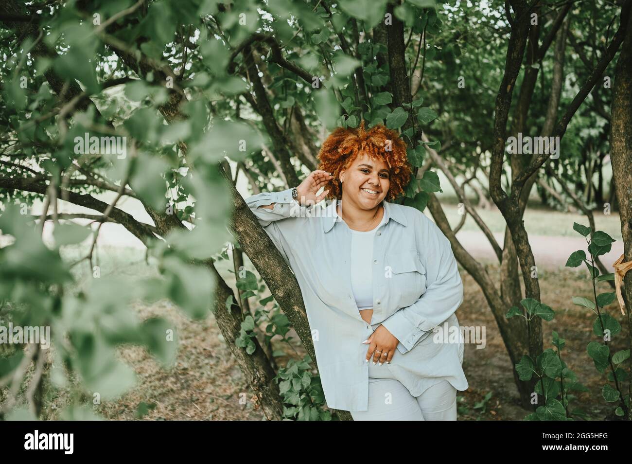 Fashion portrait of young naturally beautiful plus size African ...