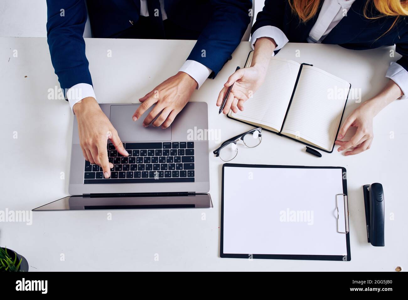 managers teamwork in the office with laptop technology Stock Photo - Alamy