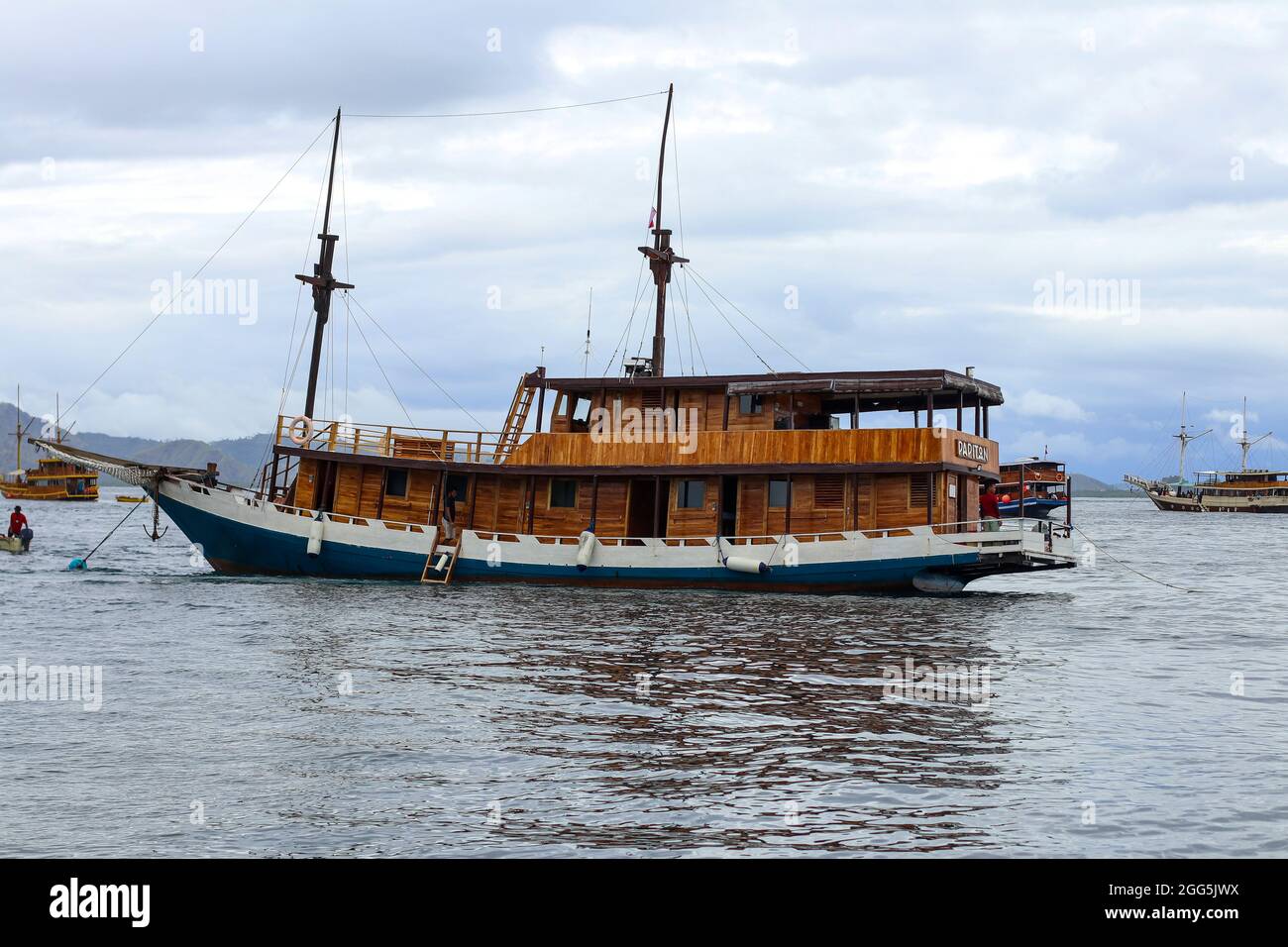 Labuan Bajo With Local Ship Yacht And Traditional Small Boat Those Was Main Transportation