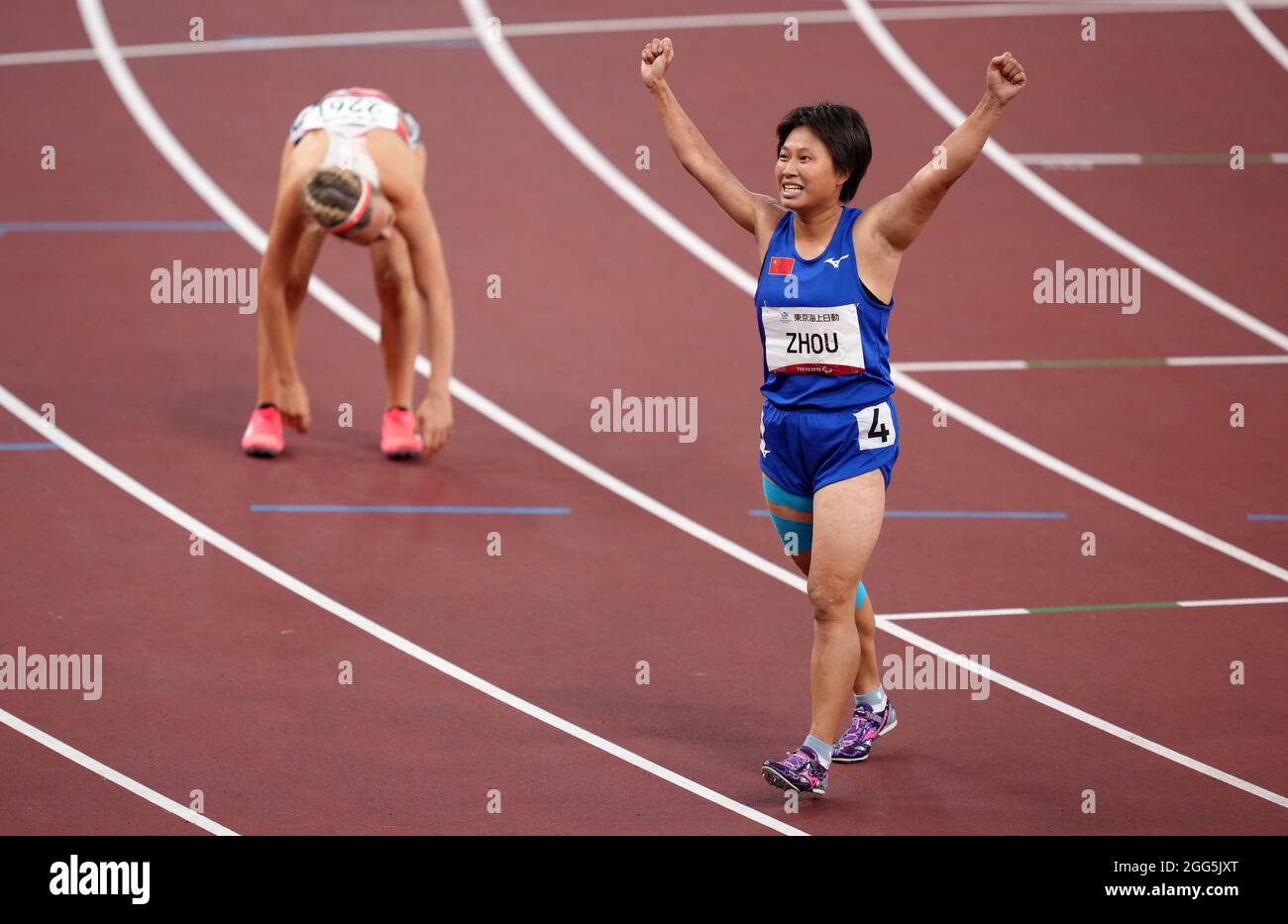 China’s Zhou Xia celebrates winning gold in the Women's 200m - T35 ...