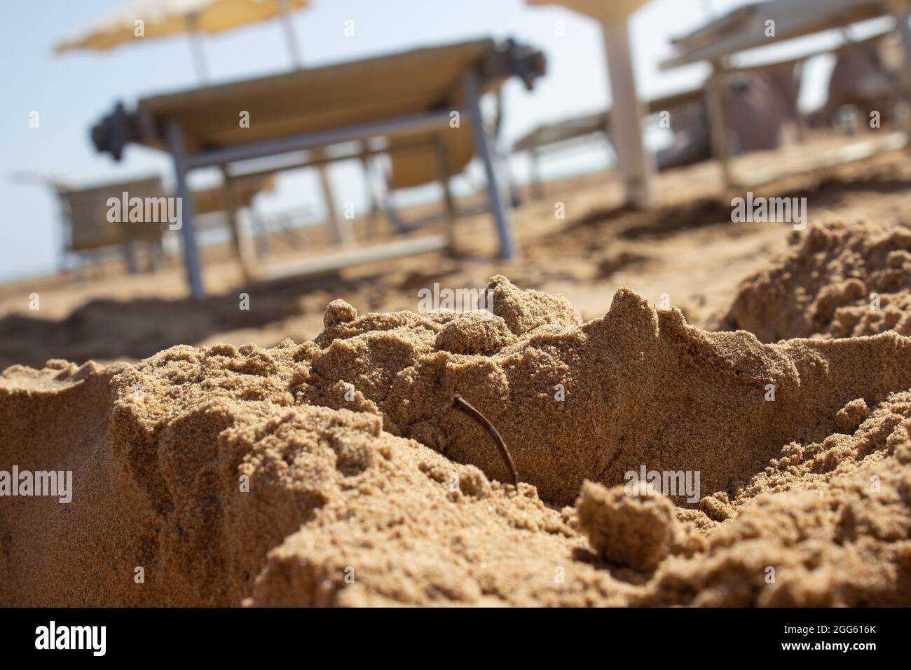 Beach from a sand-close up perspective Stock Photo - Alamy