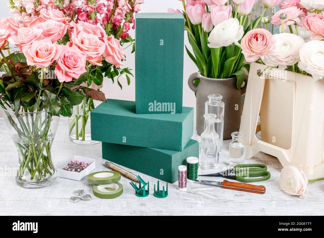 Florist workplace: flowers and accessories. Garden hobby Stock Photo ...