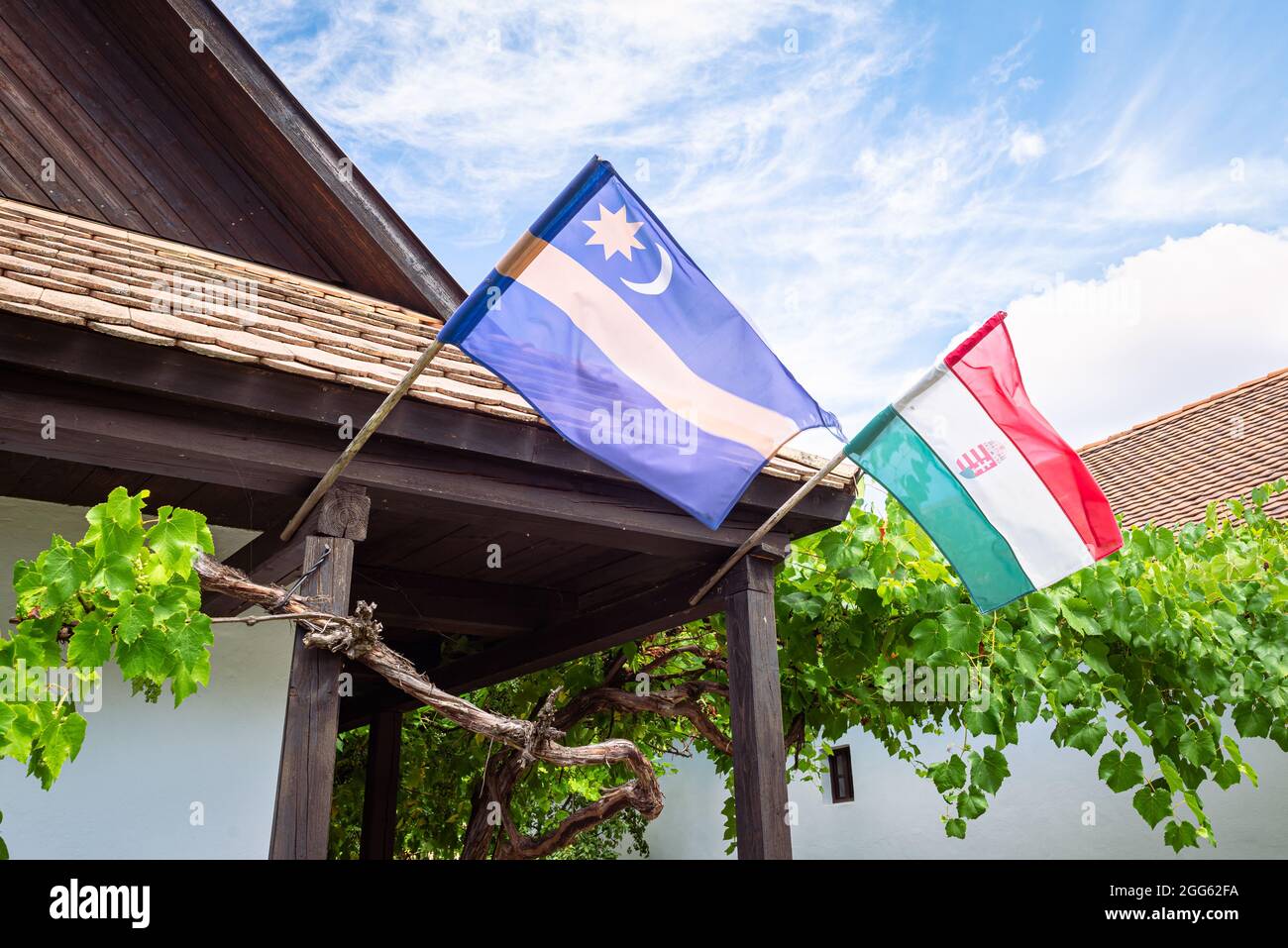 Hungarian flag (right) and flag of the Székelys (left) on a building ...
