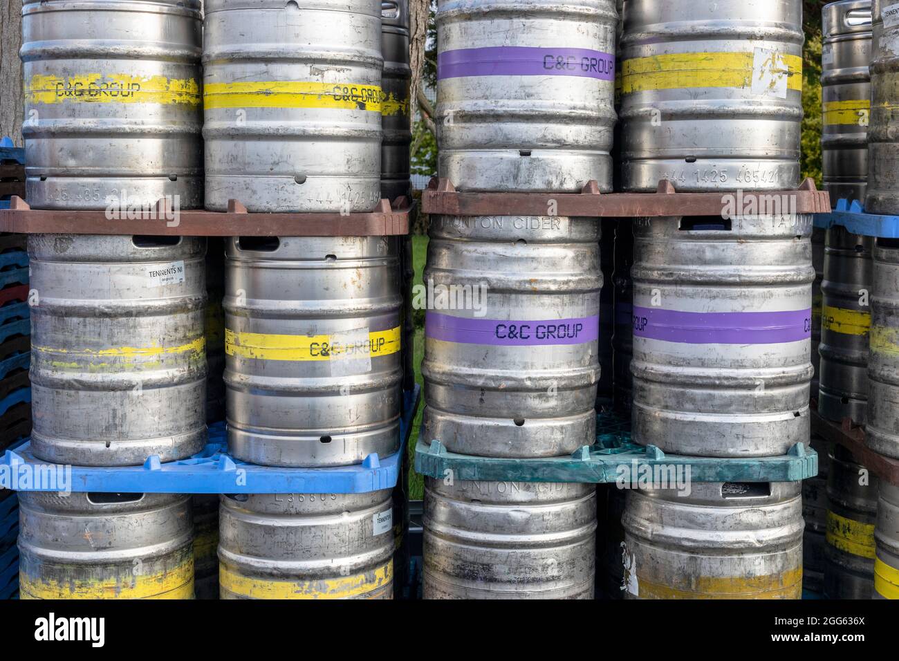 Aluminium beer, lager and cider barrels stacked outside a pub, Scotland ...