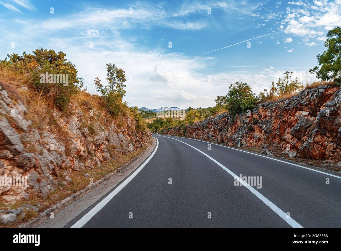 Scenic road. Road is surrounded by a magnificent natural landscape ...
