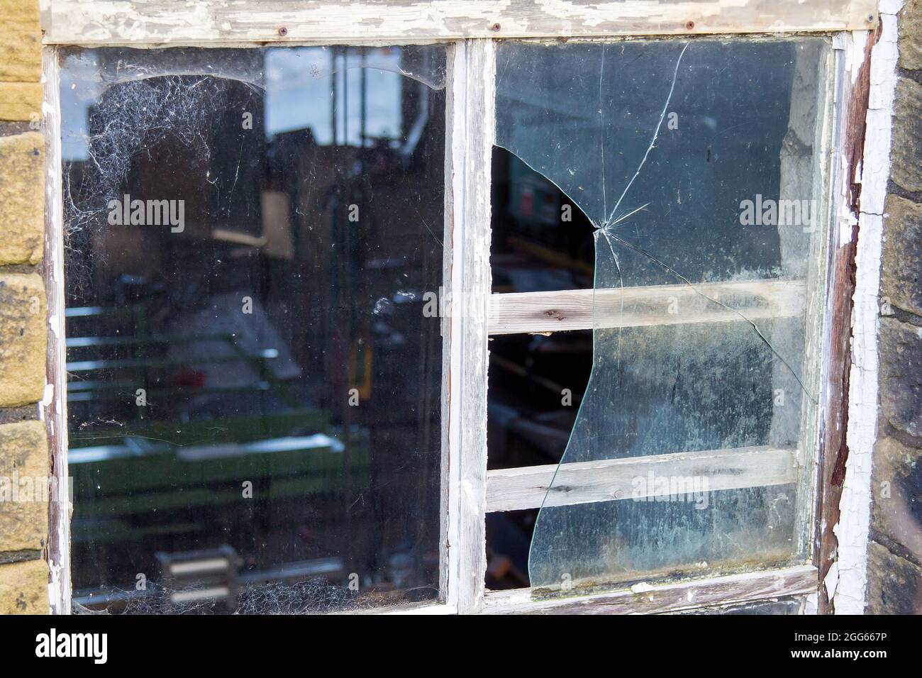 Broken window with wooden frame Stock Photo - Alamy